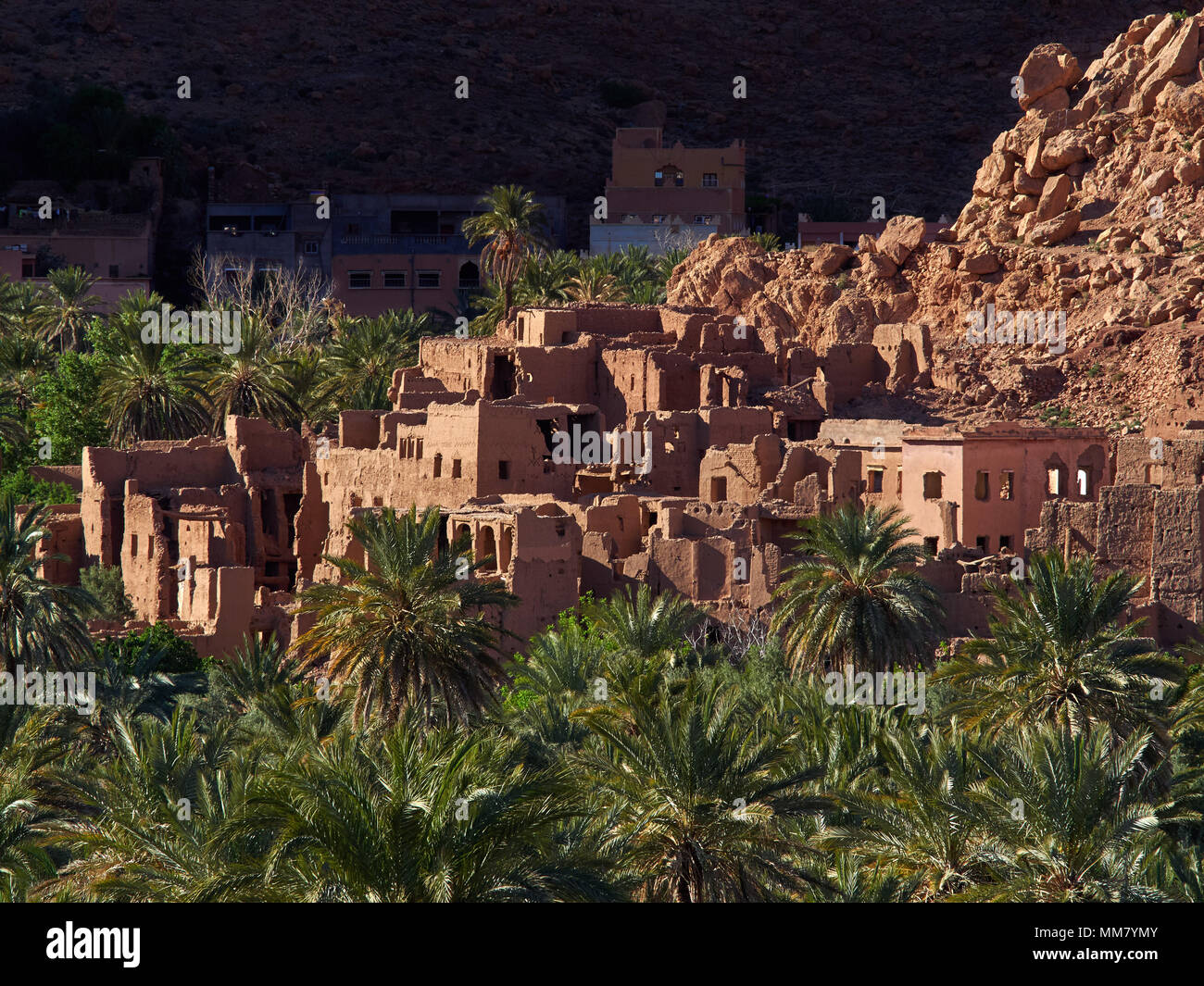 Ancient abandoned houses of Tingir village among green palm forests ...