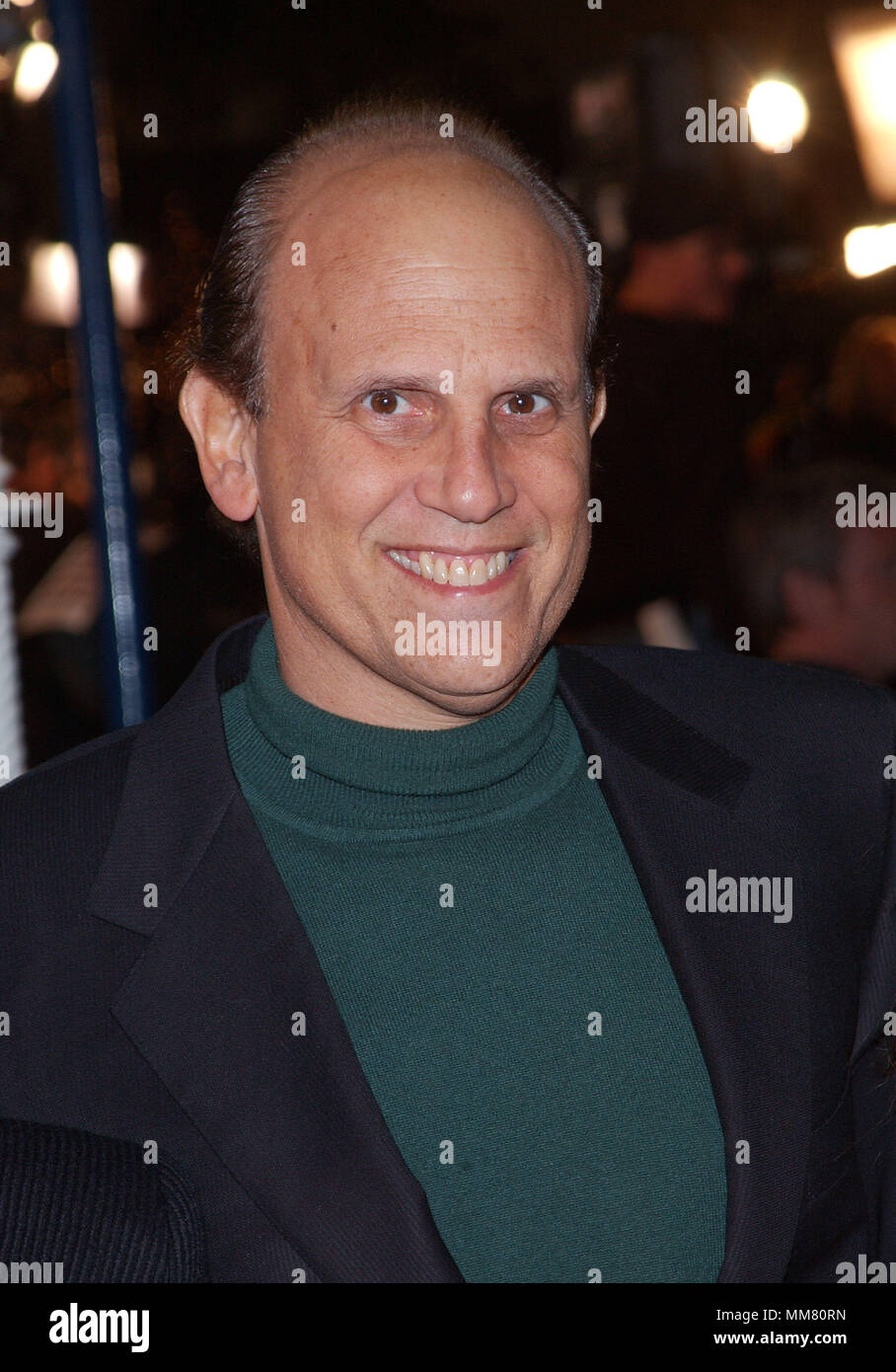 Michael Milken arriving at the Ocean Eleven premiere at the Mann's ...