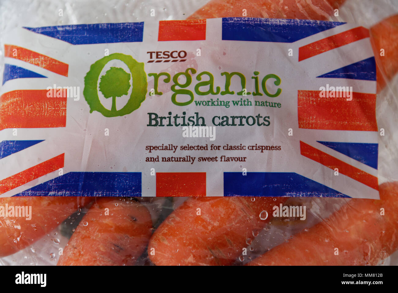 A bag of Tesco organic carrots Stock Photo - Alamy