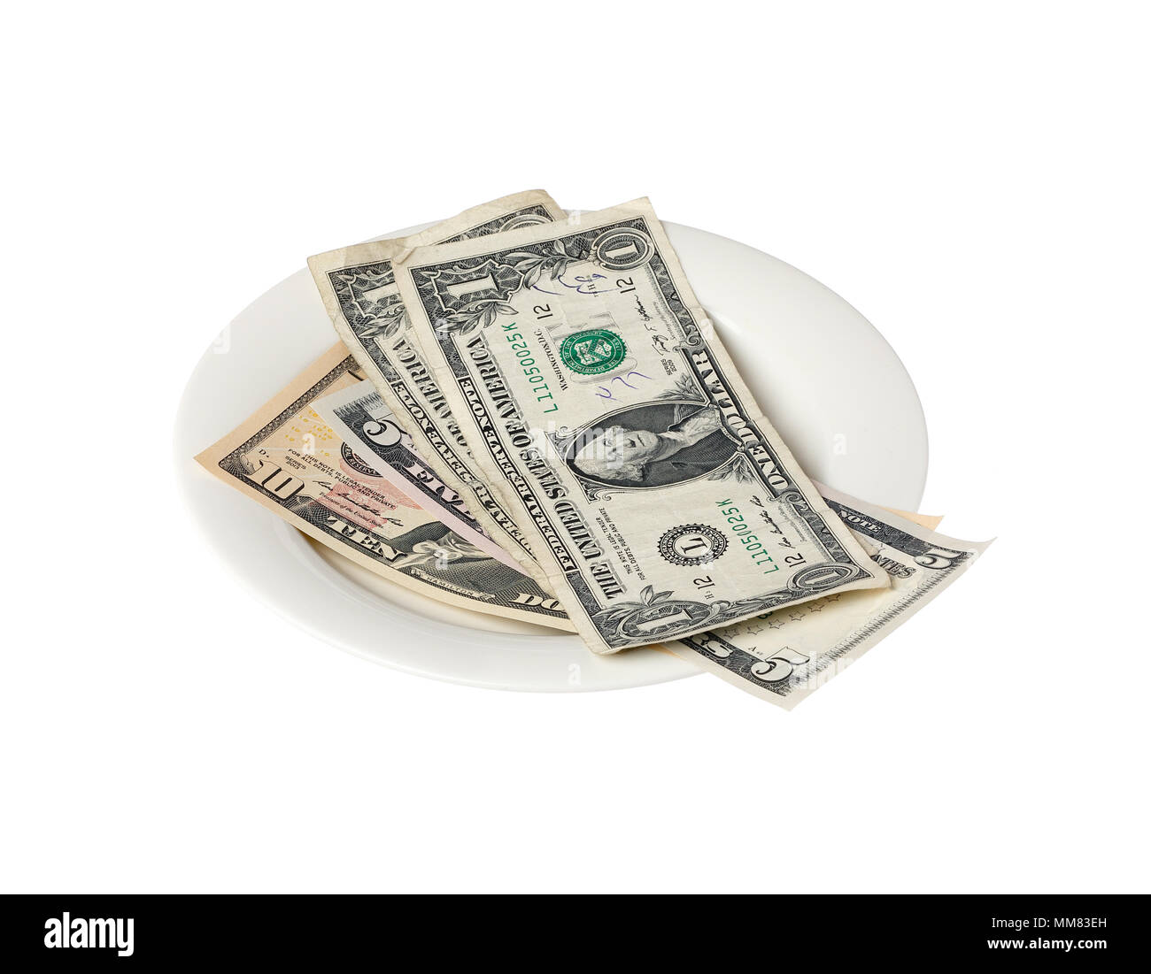 US dollar banknotes on white small plate isolated on white background ...