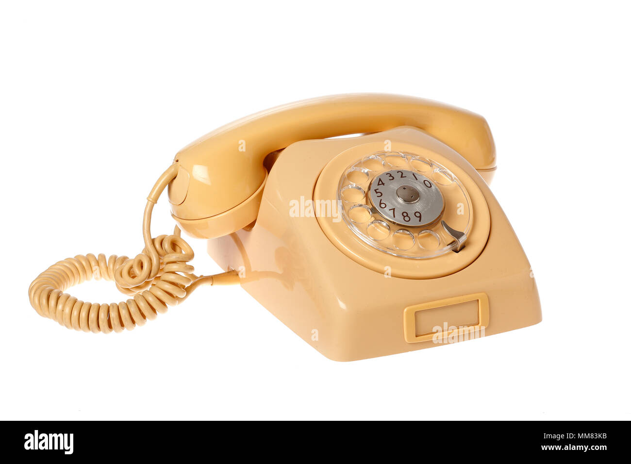 Yellow telephone with dial isolated on white background Stock Photo - Alamy