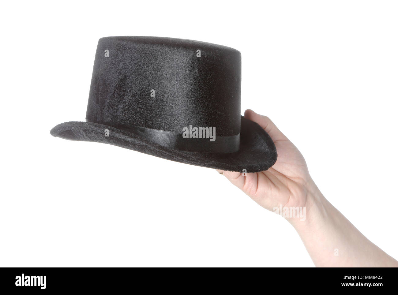 A human hand holding a black hat isolated on white Stock Photo - Alamy