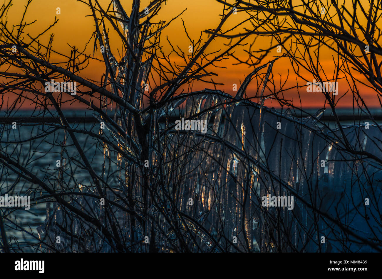 Beautiful sunset with ice reflecting the light Stock Photo - Alamy