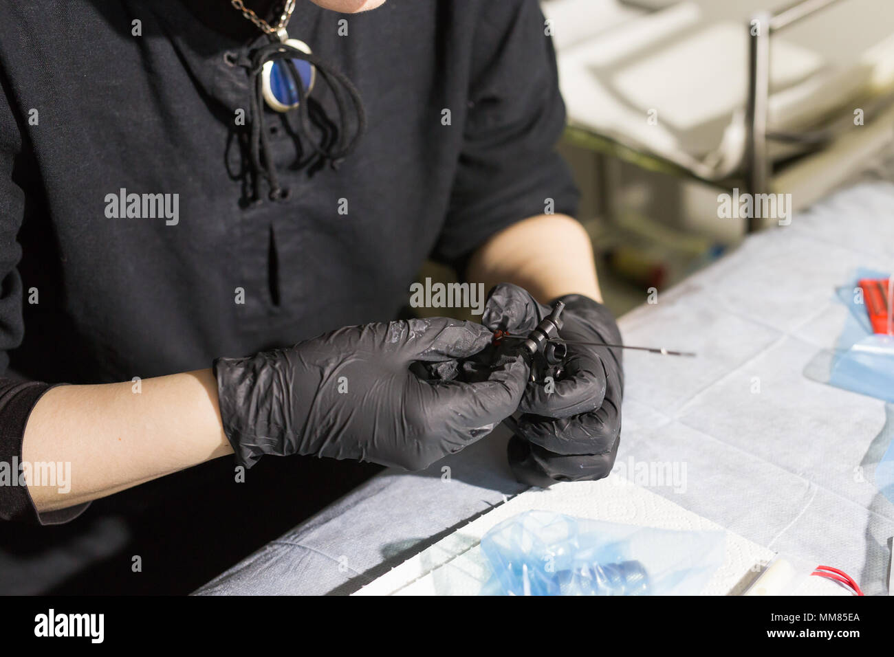 master tattoo artist prepares tools for tattooing Stock Photo - Alamy
