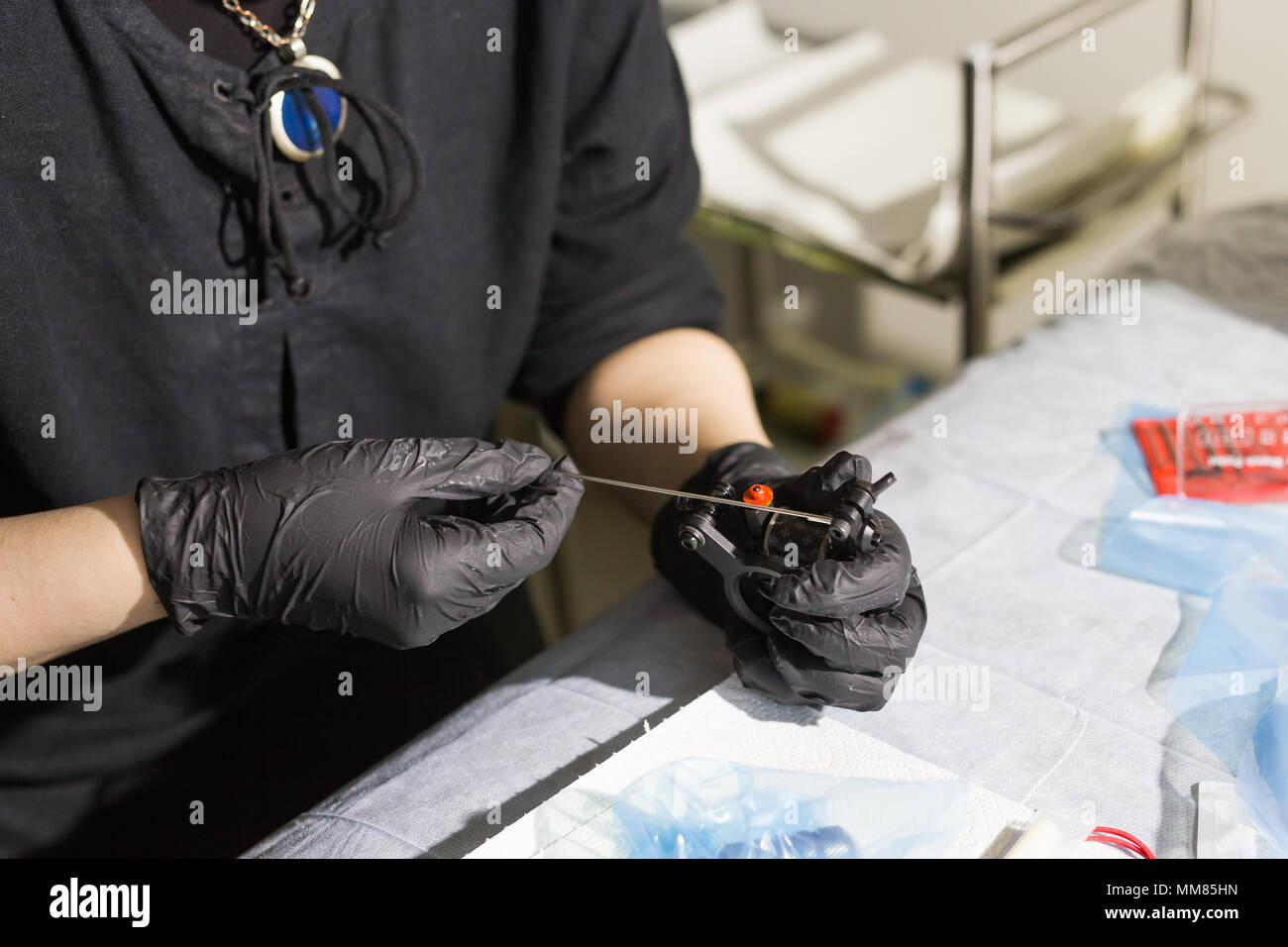 master tattoo artist prepares tools for tattooing Stock Photo - Alamy