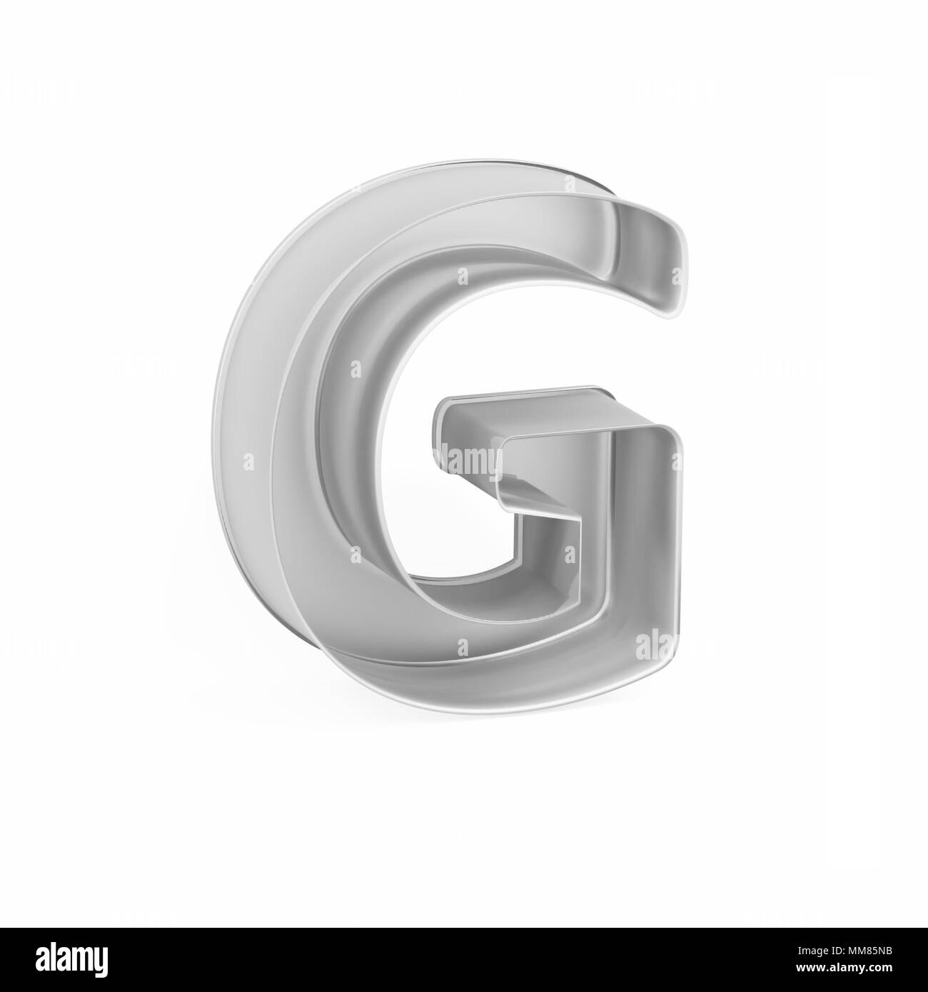 Metal baking cake pan or cookie cutter like capital letter G on white ...