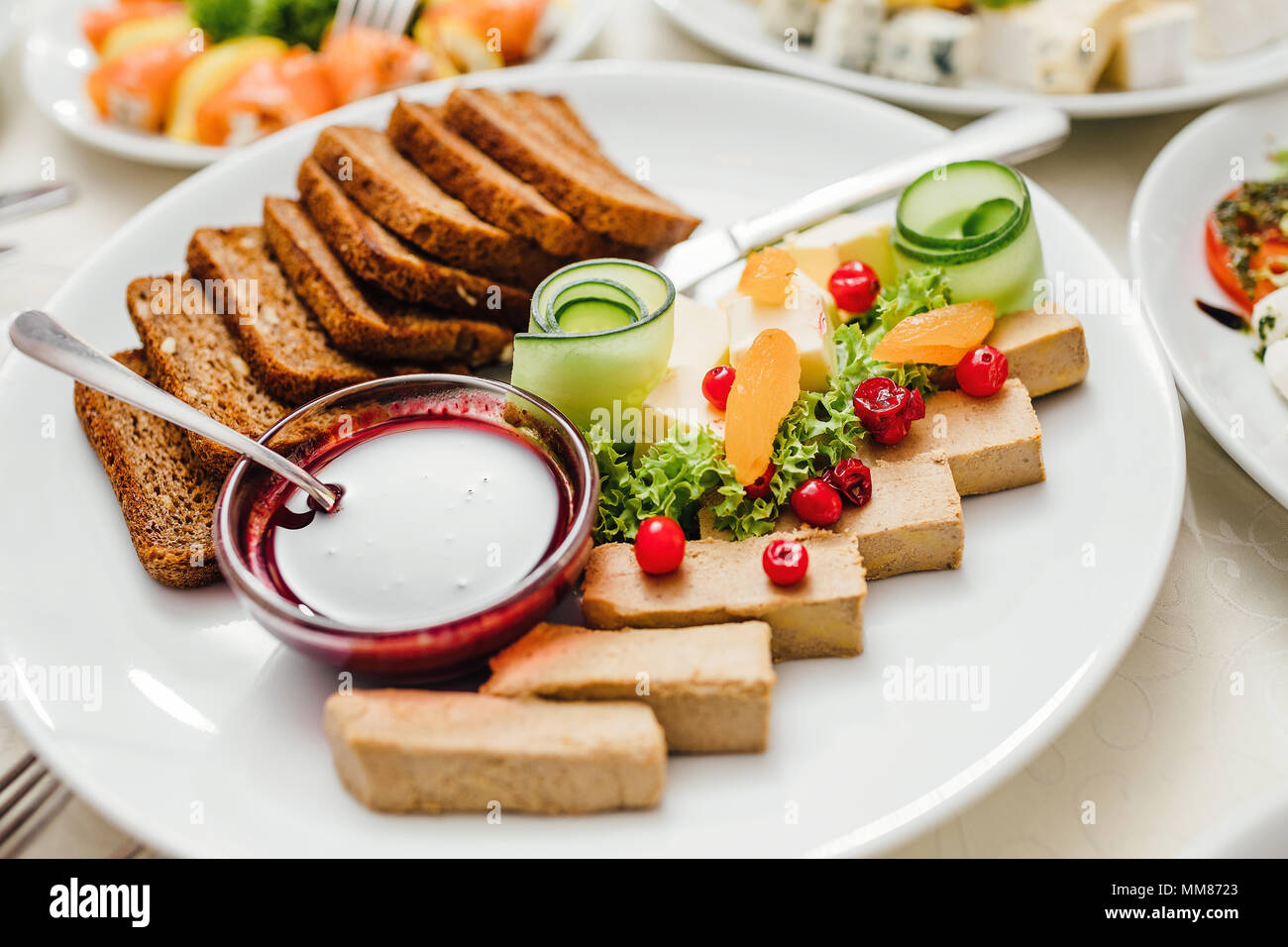 catering table set service with silverware and glass stemware at ...