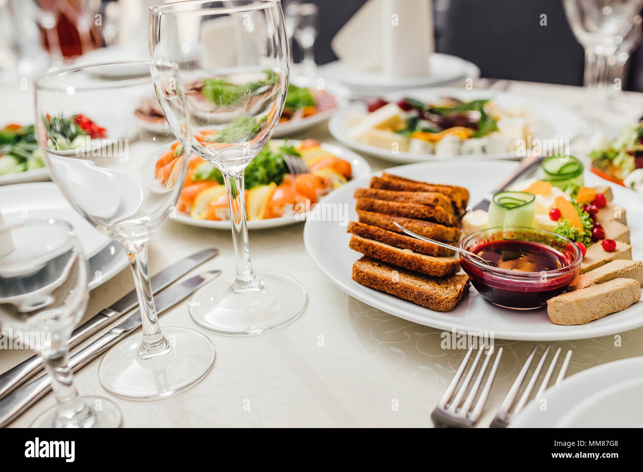 Served dishes to the table for holiday Stock Photo - Alamy