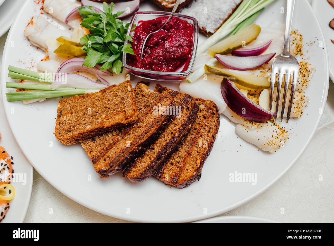 catering table set service with silverware and glass stemware at ...