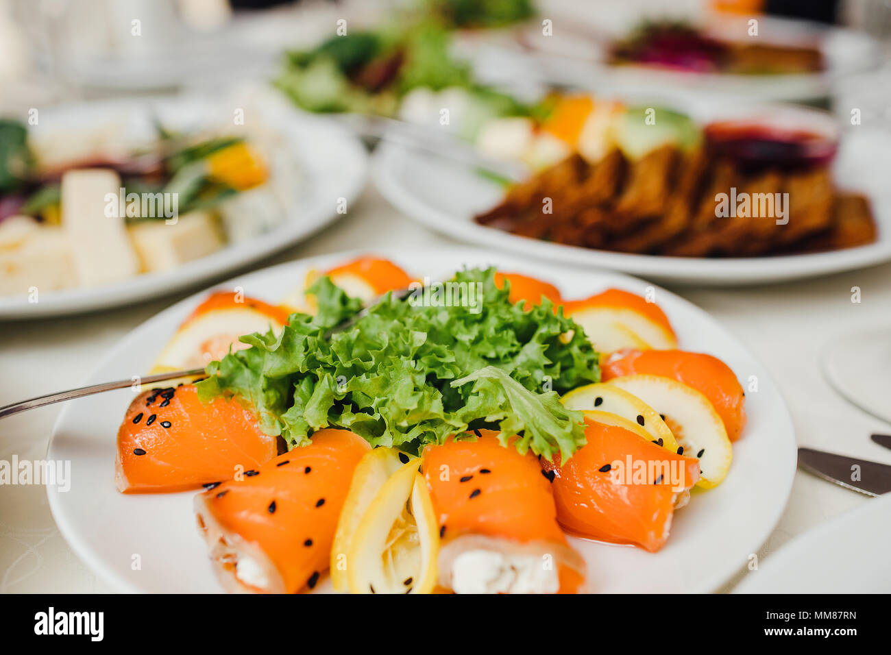 catering table set service with silverware and glass stemware at ...