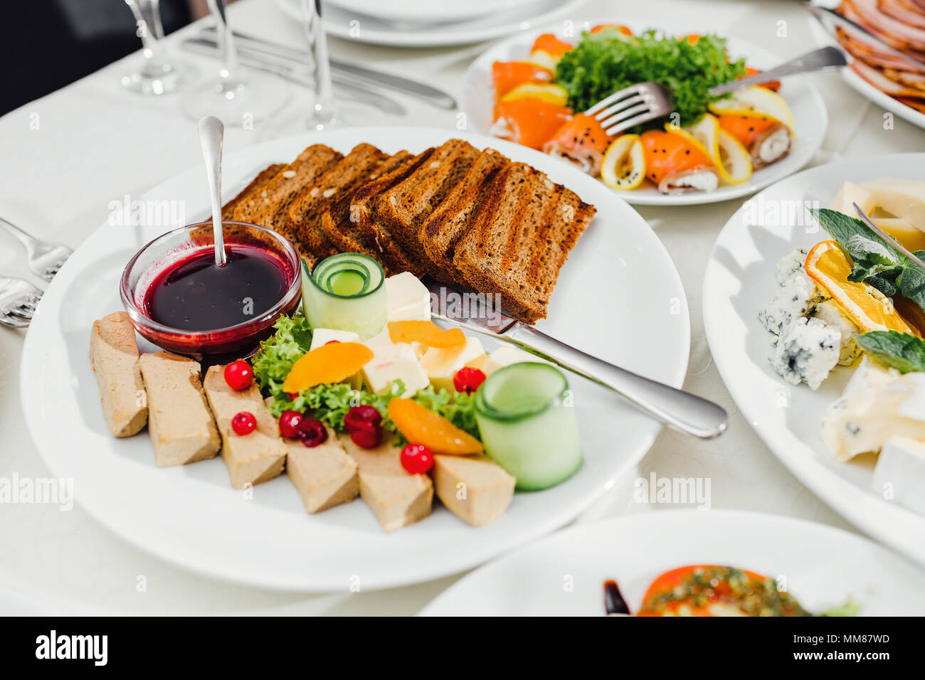 Served dishes to the table for holiday Stock Photo - Alamy