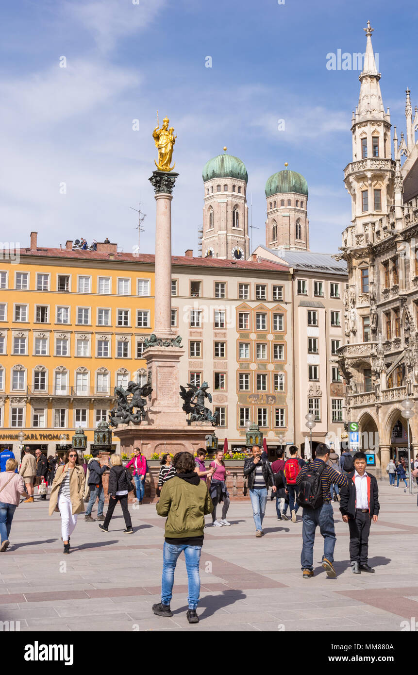 MUNICH, GERMANY - APRIL 4: Tourists at the Marienplatz square in Munich ...