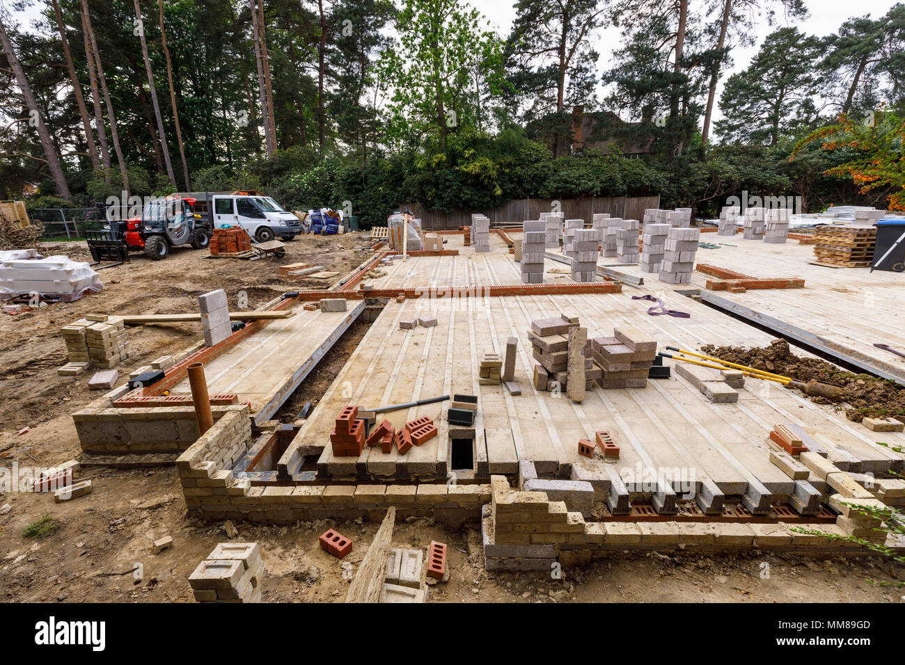 Breeze blocks stacked on the floor of a new house under construction on ...