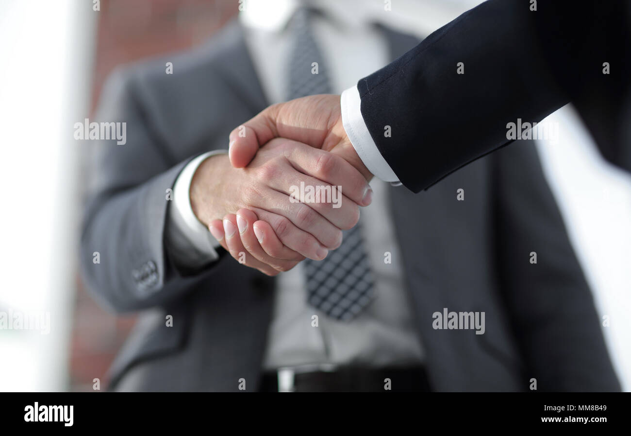 Business men giving a handshake. Business concept Stock Photo - Alamy