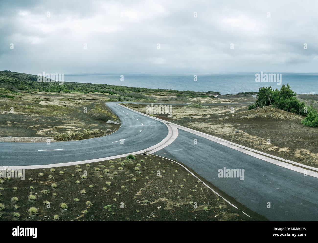 View of the roads that lead to the ashy volcanic landscape of the ...