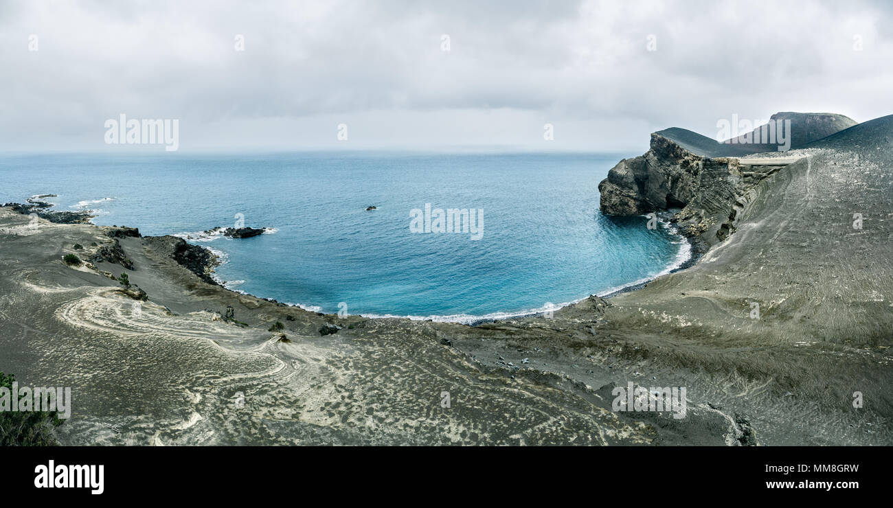 Panoramic view of the ashy, volcanic rock formations in contact with ...
