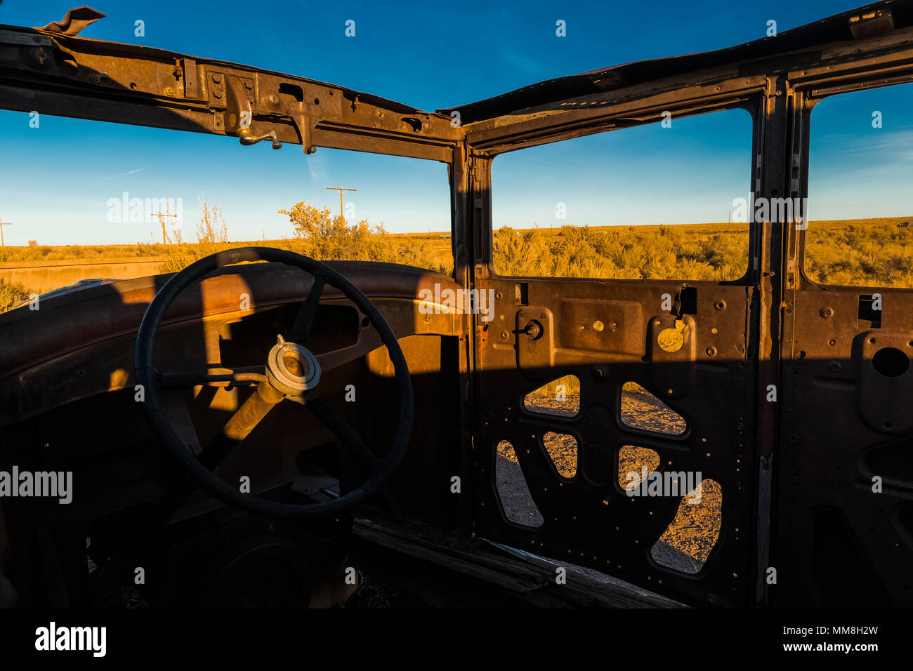 Rusted old Studebaker at a memorial site along the route of old Route ...