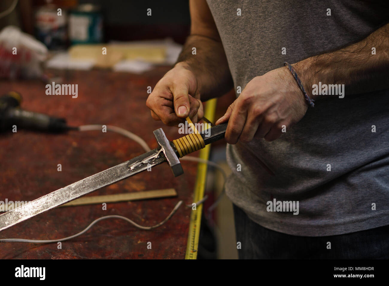 Hand On Sword Hilt High Resolution Stock Photography and Images - Alamy