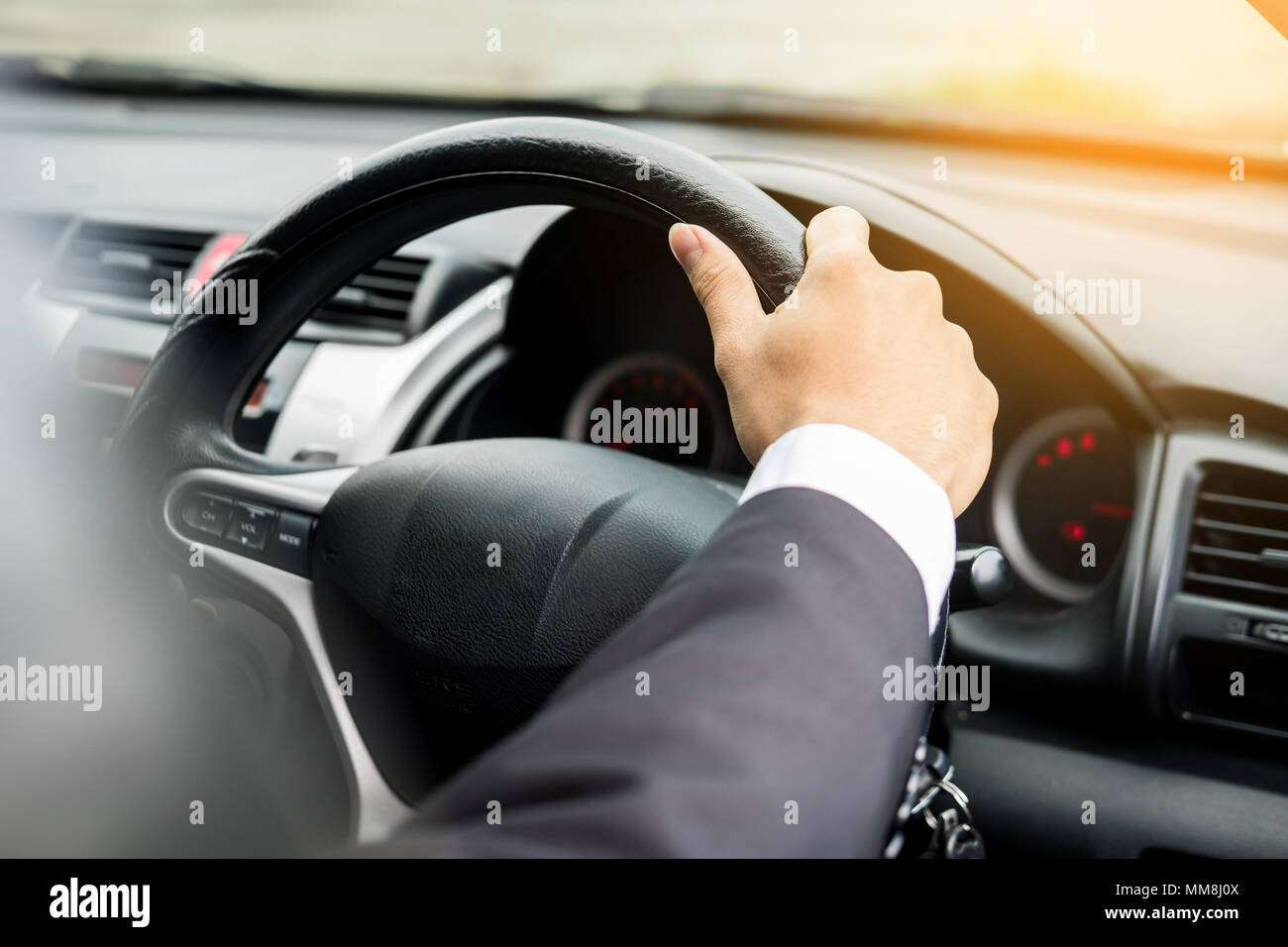 Businessman driving luxury convertible hi-res stock photography and ...