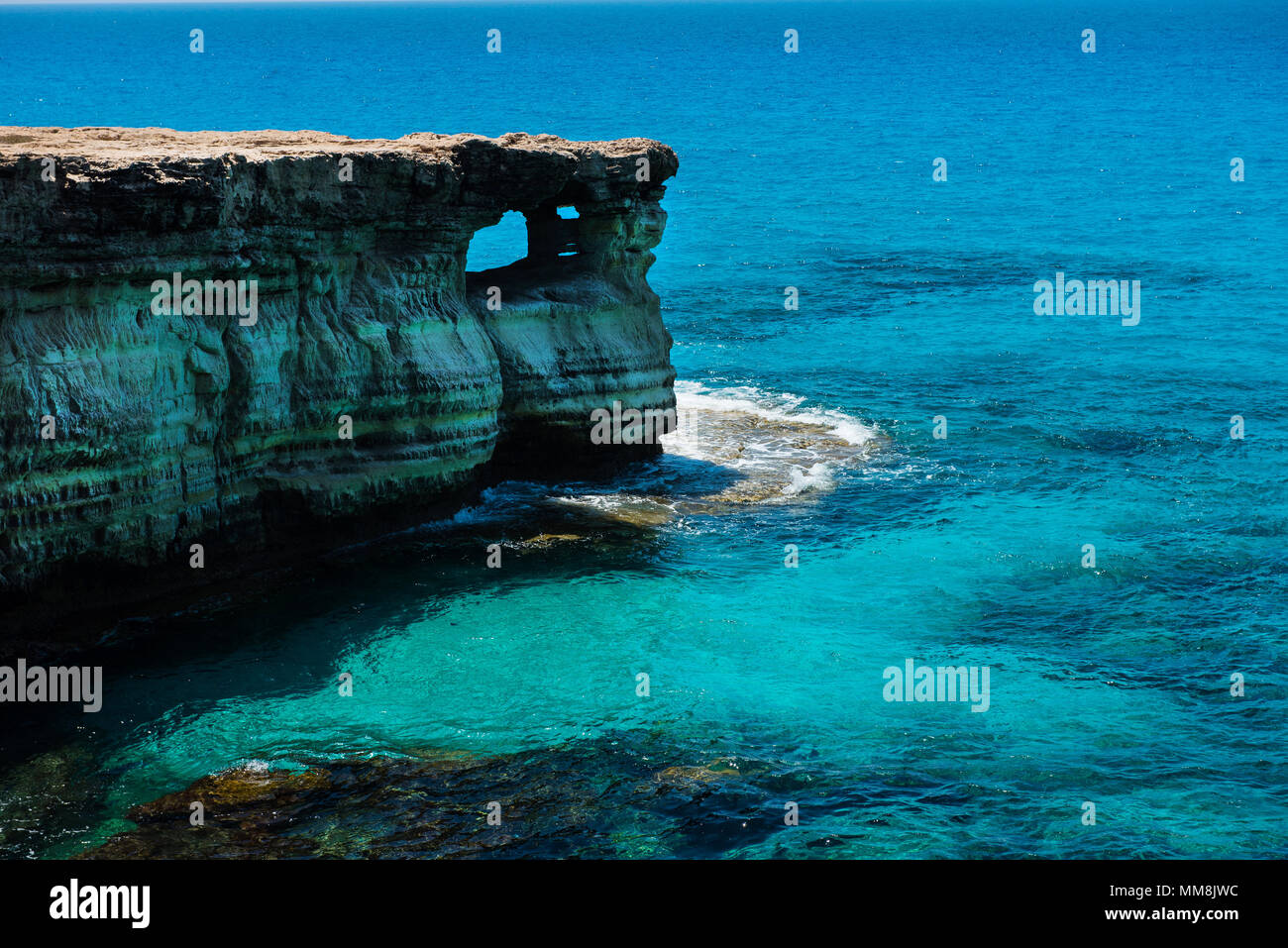 Sea caves (littoral caves) near Ayia Napa, Mediterranean sea coast ...
