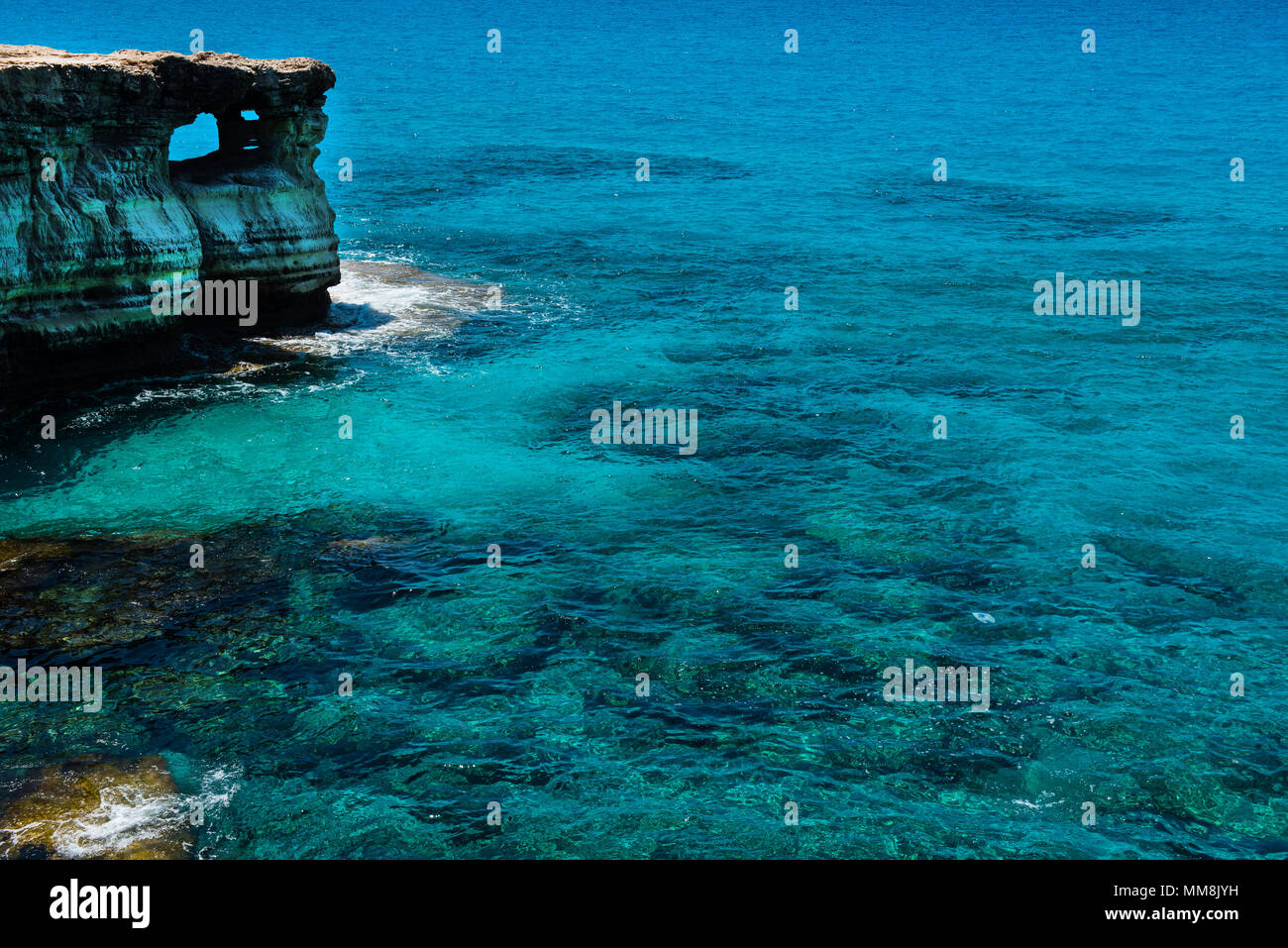 Sea caves (littoral caves) near Ayia Napa, Mediterranean sea coast ...
