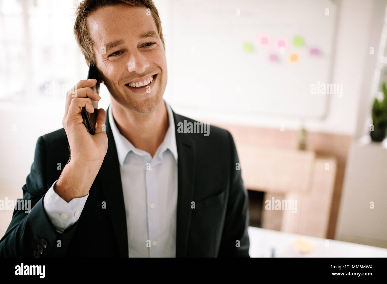 Business man suit smart phone talking call hi-res stock photography and ...