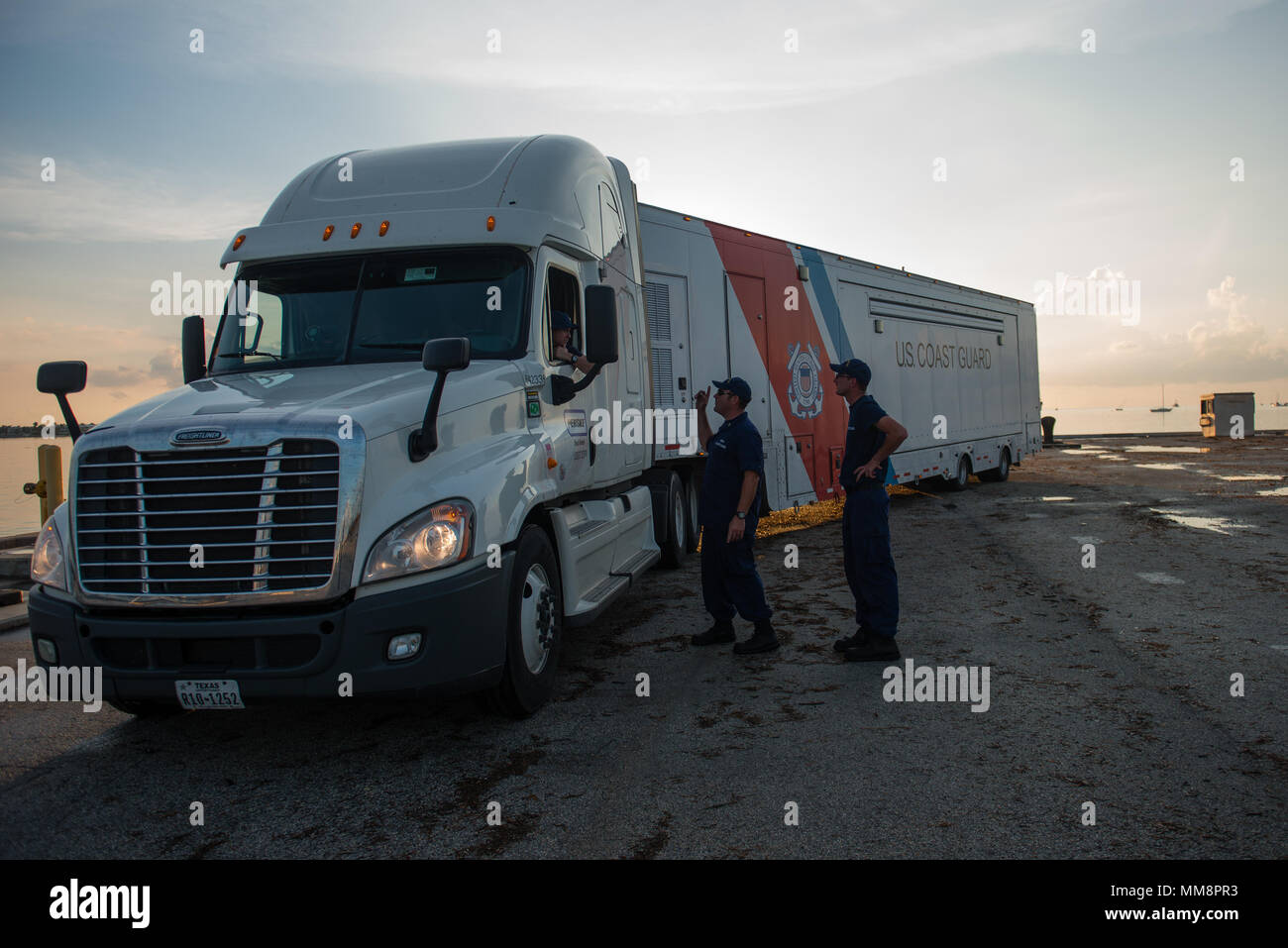Members of the Deployable Communications Support Forces set up an ...