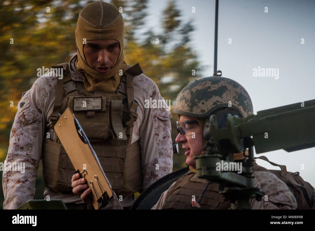 Capt. Christopher Whitson, a company commander, and Sgt. Rene Lozoya, a ...