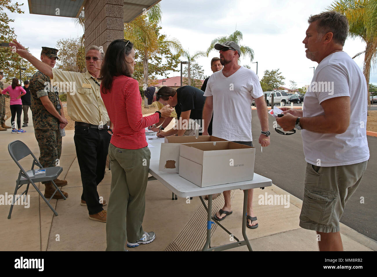 Families and friends of the 1st Marine Raider Support Battalion sign in ...