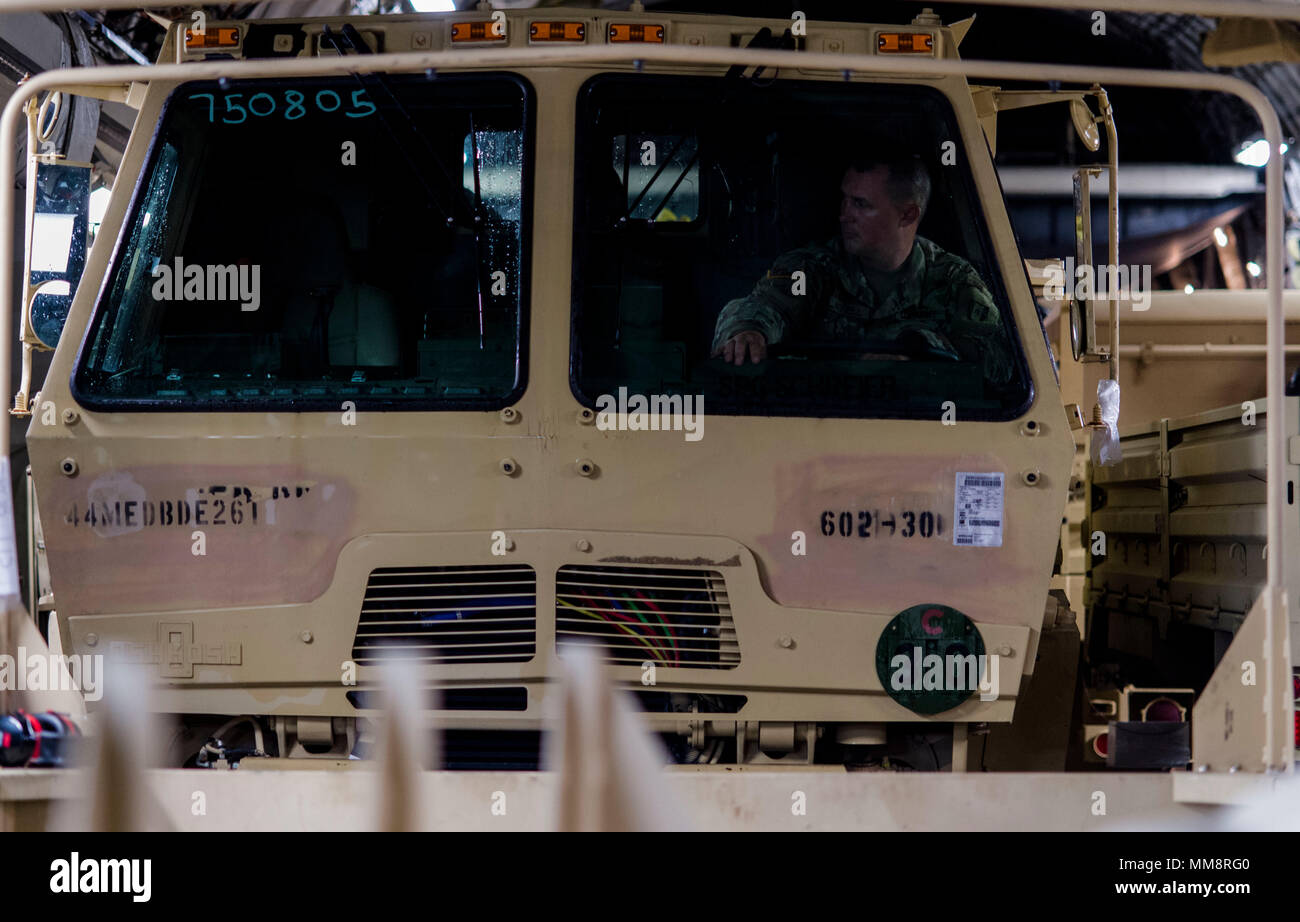 U.S. Air Force loadmasters assigned to the 14th Airlift Wing and 3rd ...