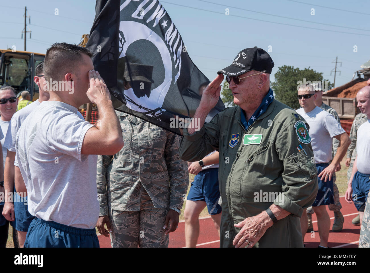 Retired Lt. Col. John Yuill, a Vietnam prisoner of war, passes the POW ...