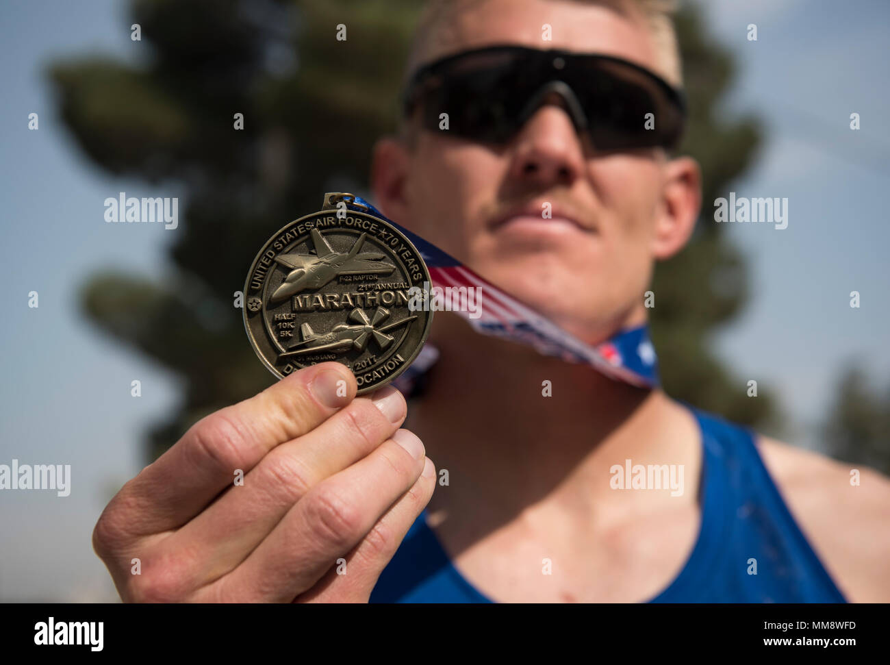 Chaplain (Capt.) Joshua Flynn, 455th Air Expeditionary Wing, shows his ...