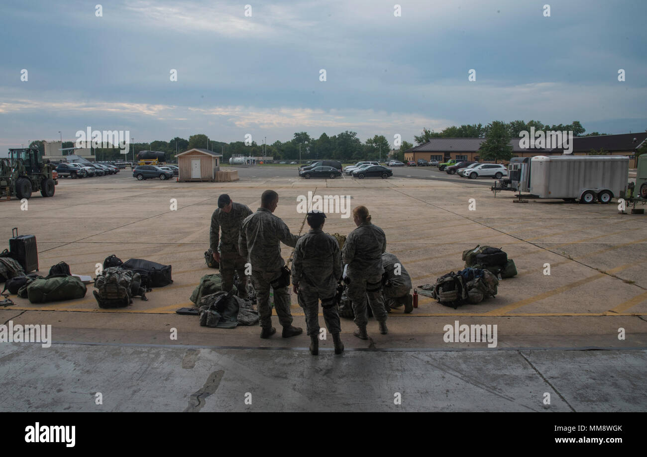 108th Security Forces Squadron Airmen arrive early and wait for out ...