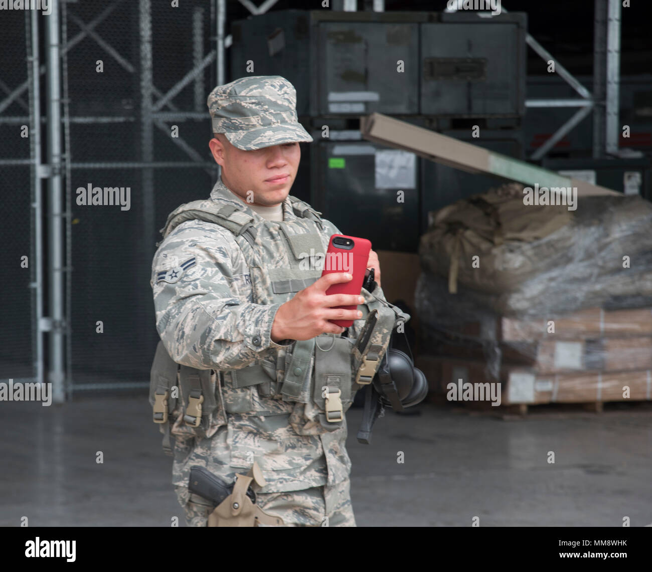 Airman First Class Justin Rodriguez takes a picture of himself to send ...