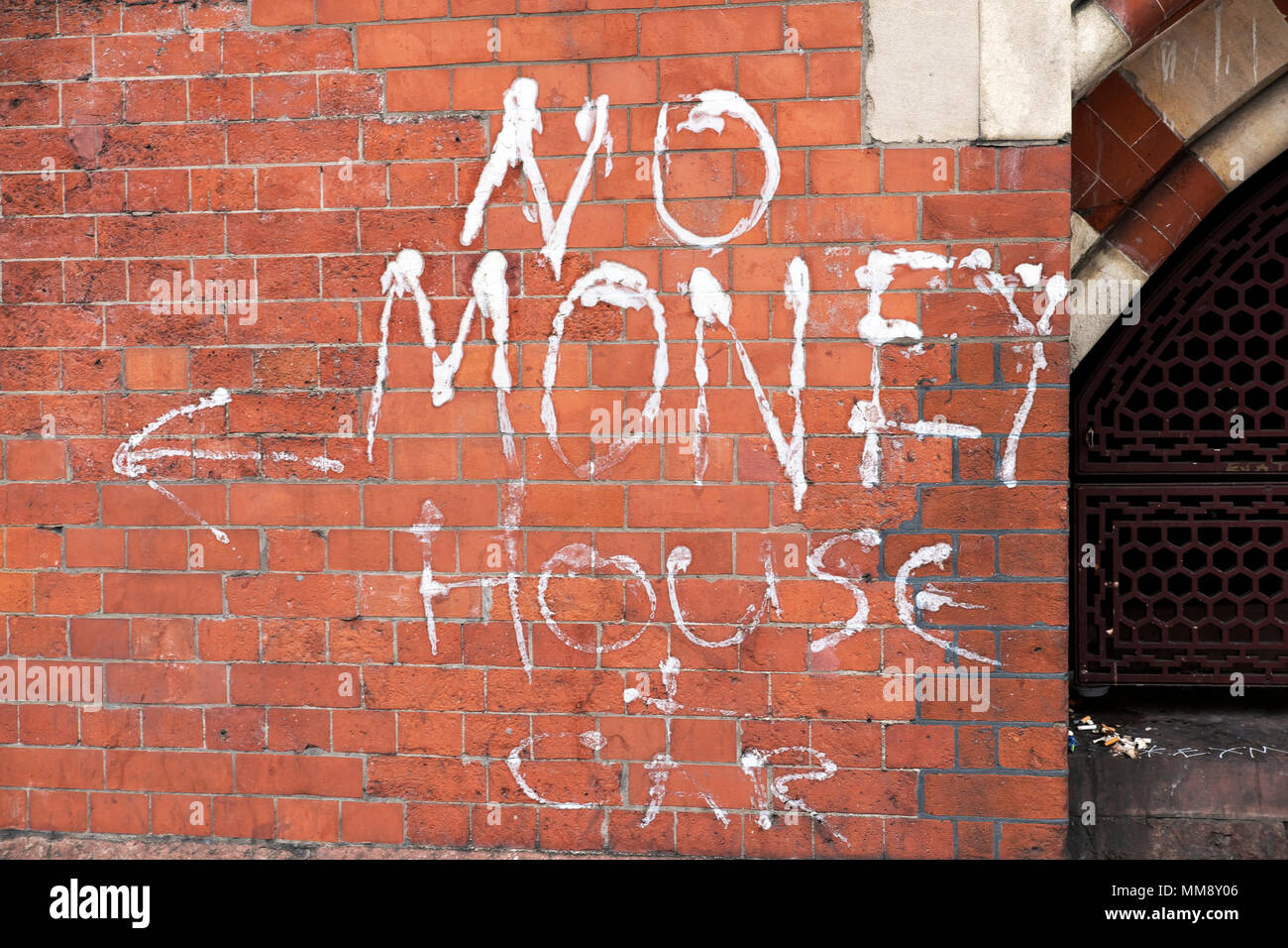 Homelessness graffiti by poor person on wall of St Pancras Station "No ...