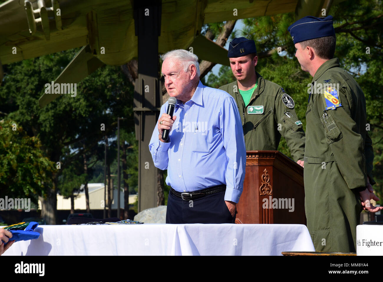 Bob Hill addresses the audience after unveiling the contents of a time ...