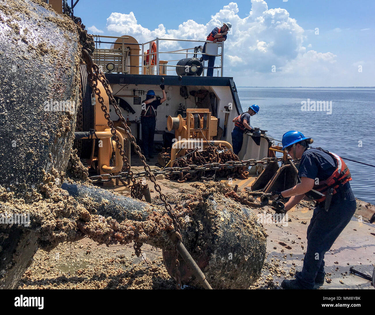 Crewmembers from the Coast Guard Cutter Joshua Appleby, a 175-foot ...