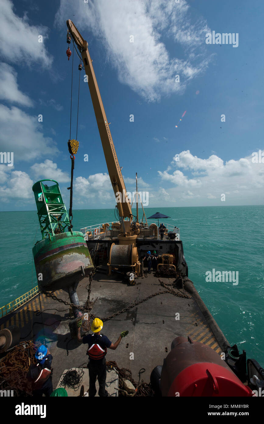 Crewmembers from the Coast Guard Cutter Joshua Appleby, a 175-foot ...