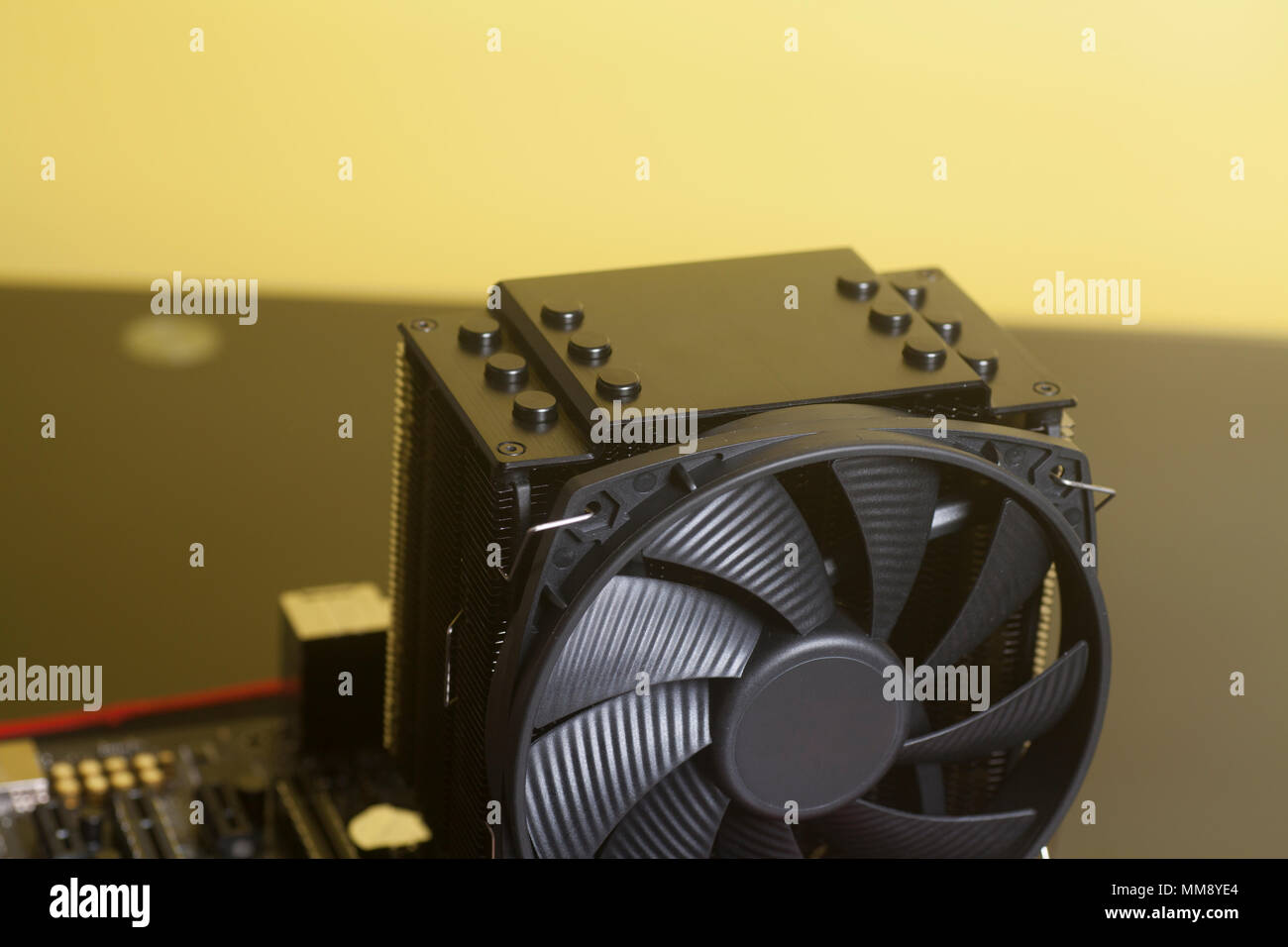 CPU fan processor cooler on a yellow background Stock Photo - Alamy