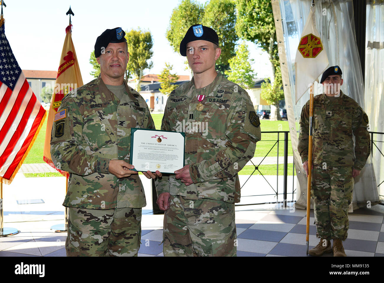 U. S. Col. Eric M. Berdy, (left), commander of U.S. Army Garrison Italy ...