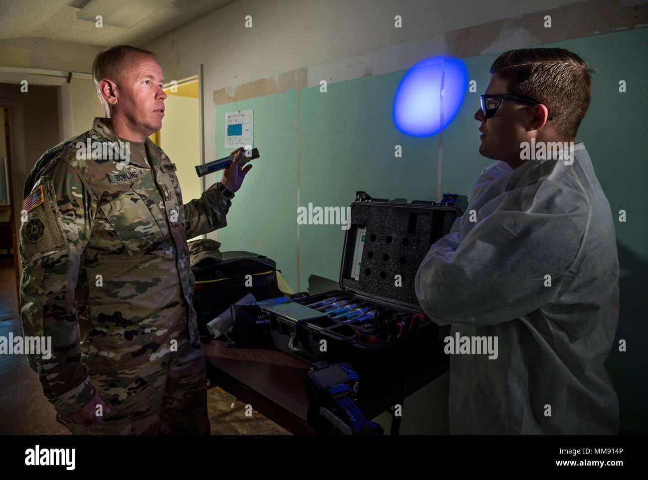 Special Agent Ronald Bowling, a warrant officer with the 383rd Military ...