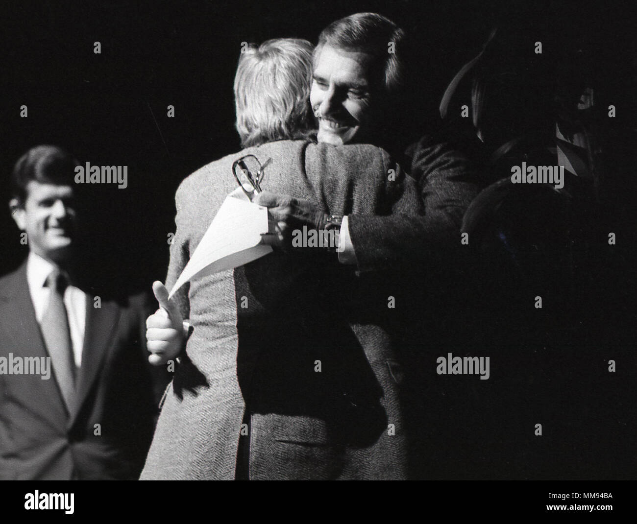 Snapshot of two men embracing Stock Photo - Alamy