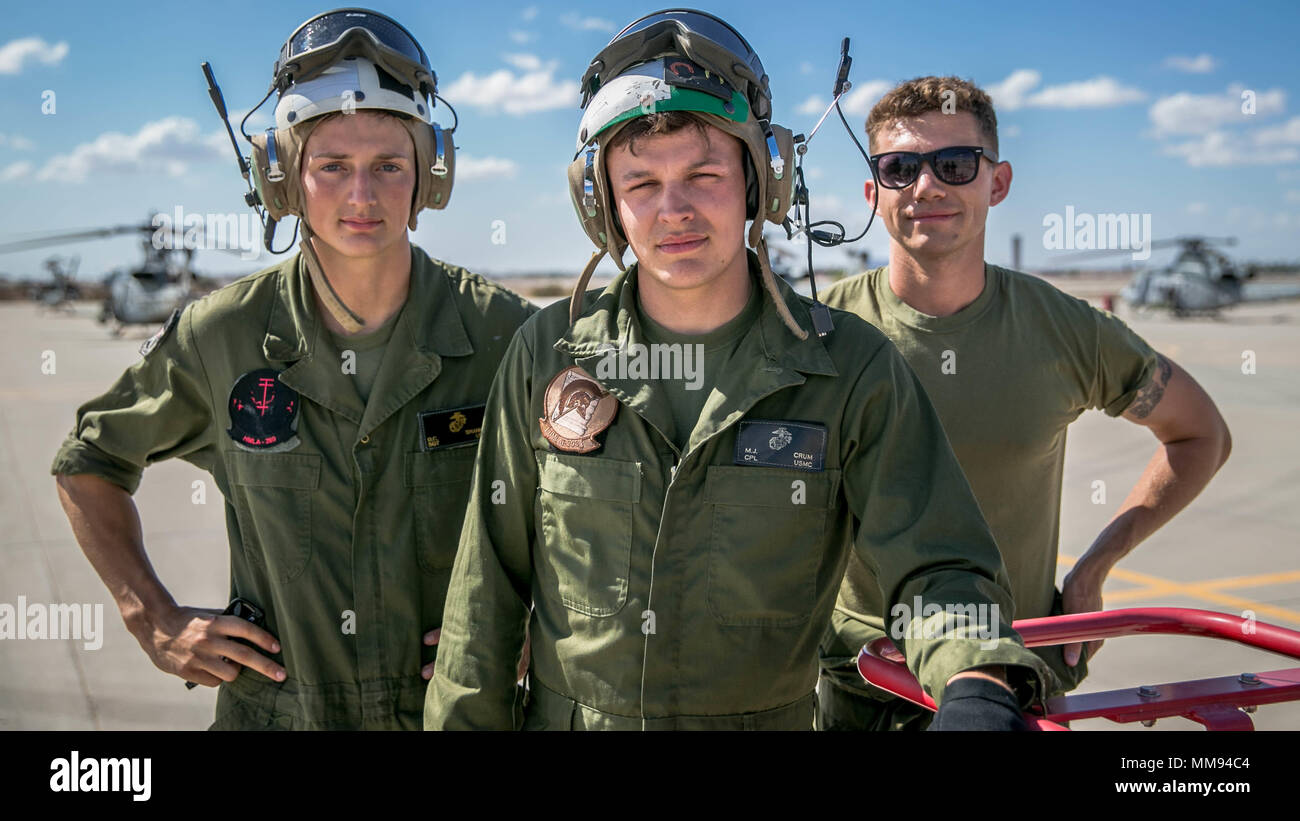 U.S. Marine Corps Sgt. Dustin Shankle, left, Cpl. Mason Crum, and Cpl ...