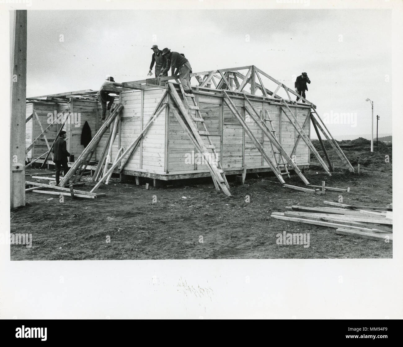 Snapshot of carpenters, building a structure Stock Photo - Alamy