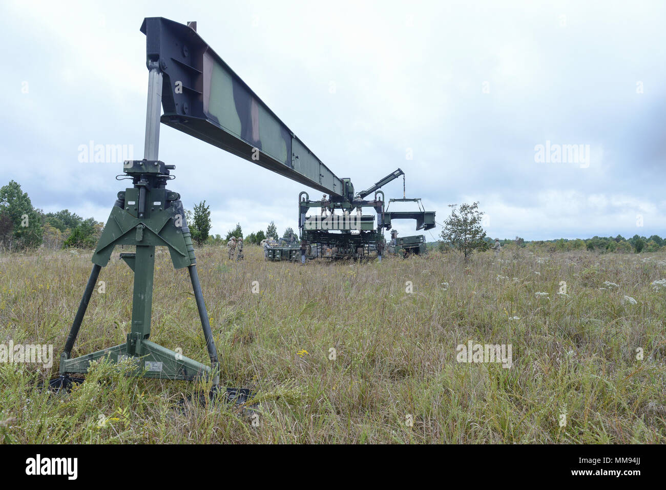 Members of the 19th Engineers Battalion assemble and set a land bridge ...