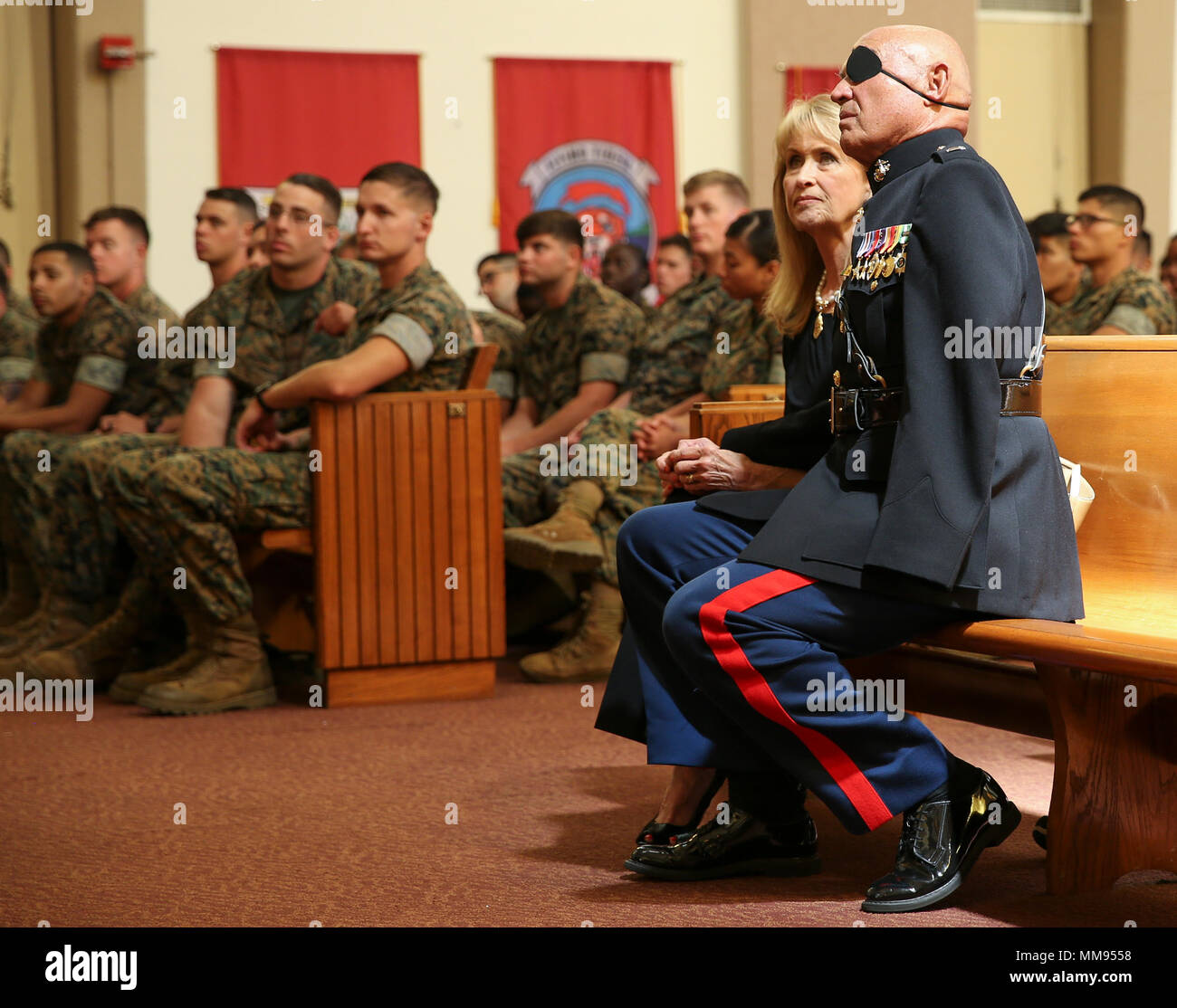 Retired 1st Lt. Patrick C. McClary, right, and his wife, Deanna, listen ...