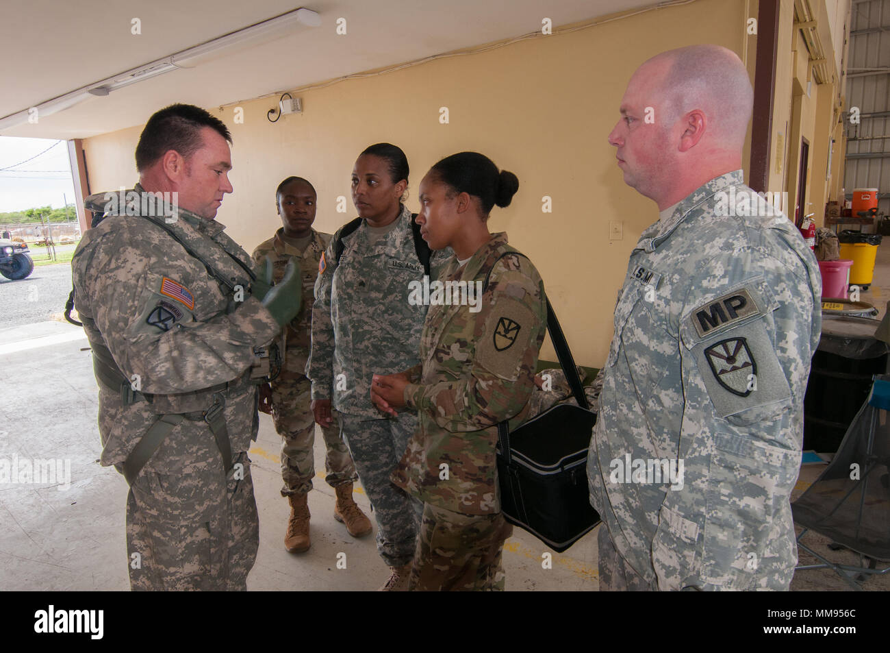 Sgt. Paul Scribner; a UH-60L Black Hawk crew chief gives a safety brief ...