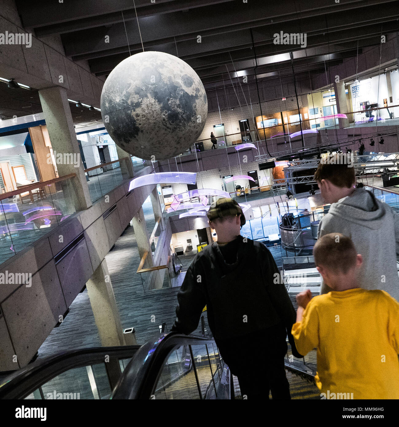 Main hall of the Boston Museum of Science at night, showing three ...