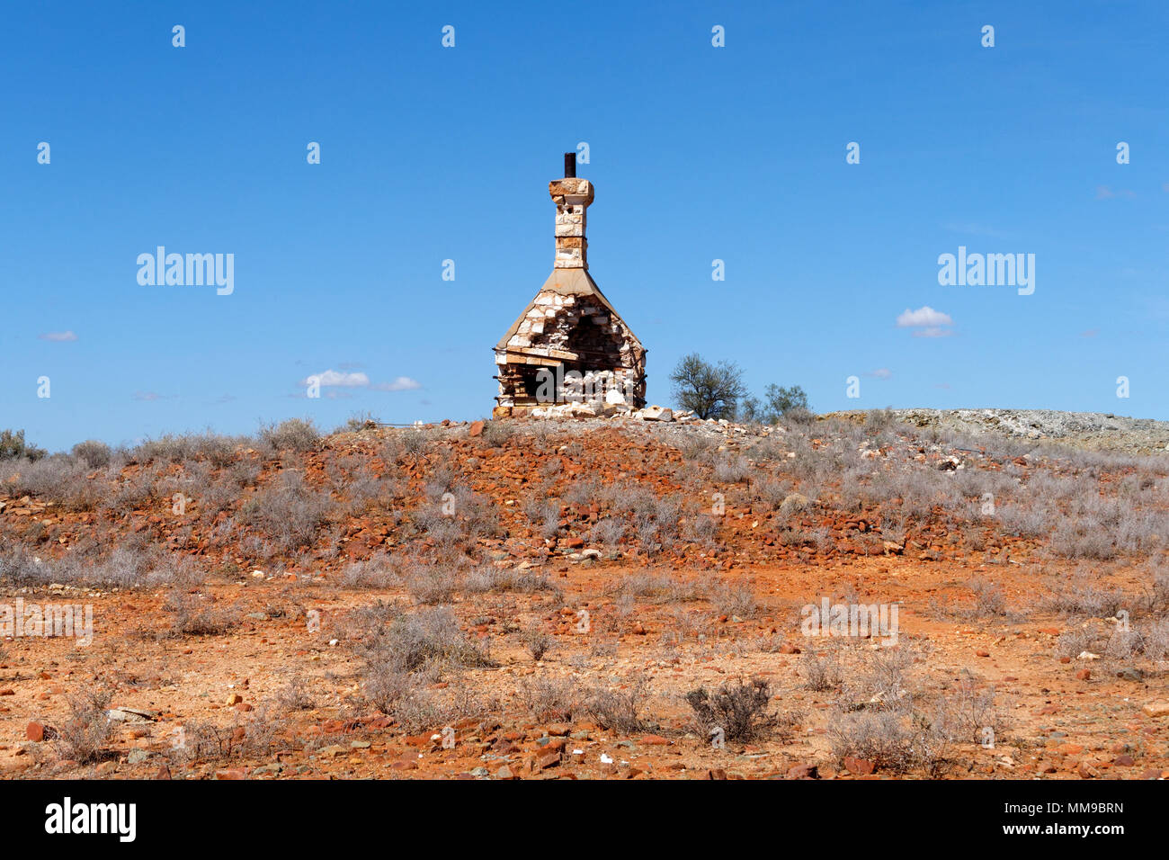 Ruin of a stone chimney fireplace, the remains of the Cue hospital ...