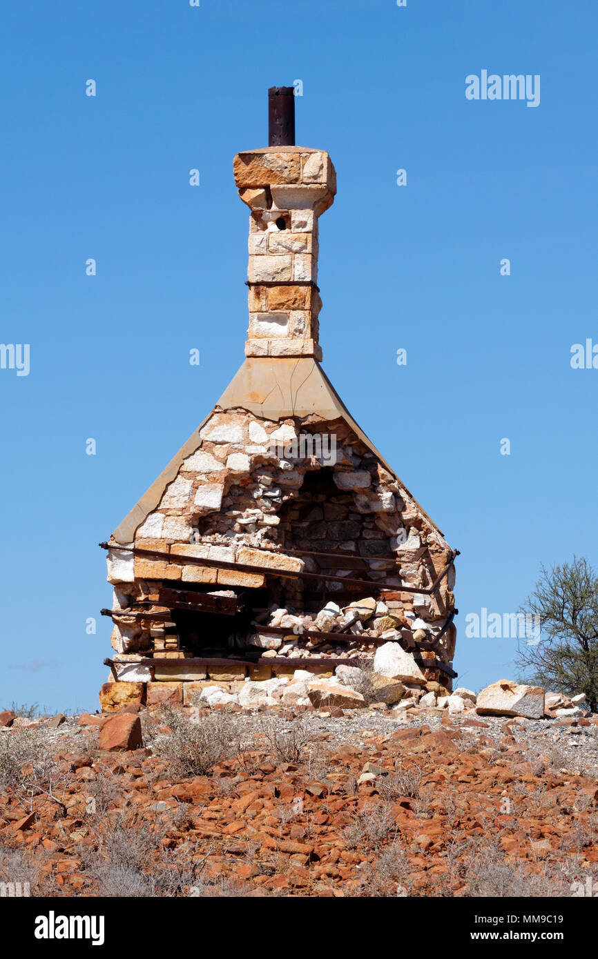 Ruin of a stone chimney fireplace, the remains of the Cue hospital ...